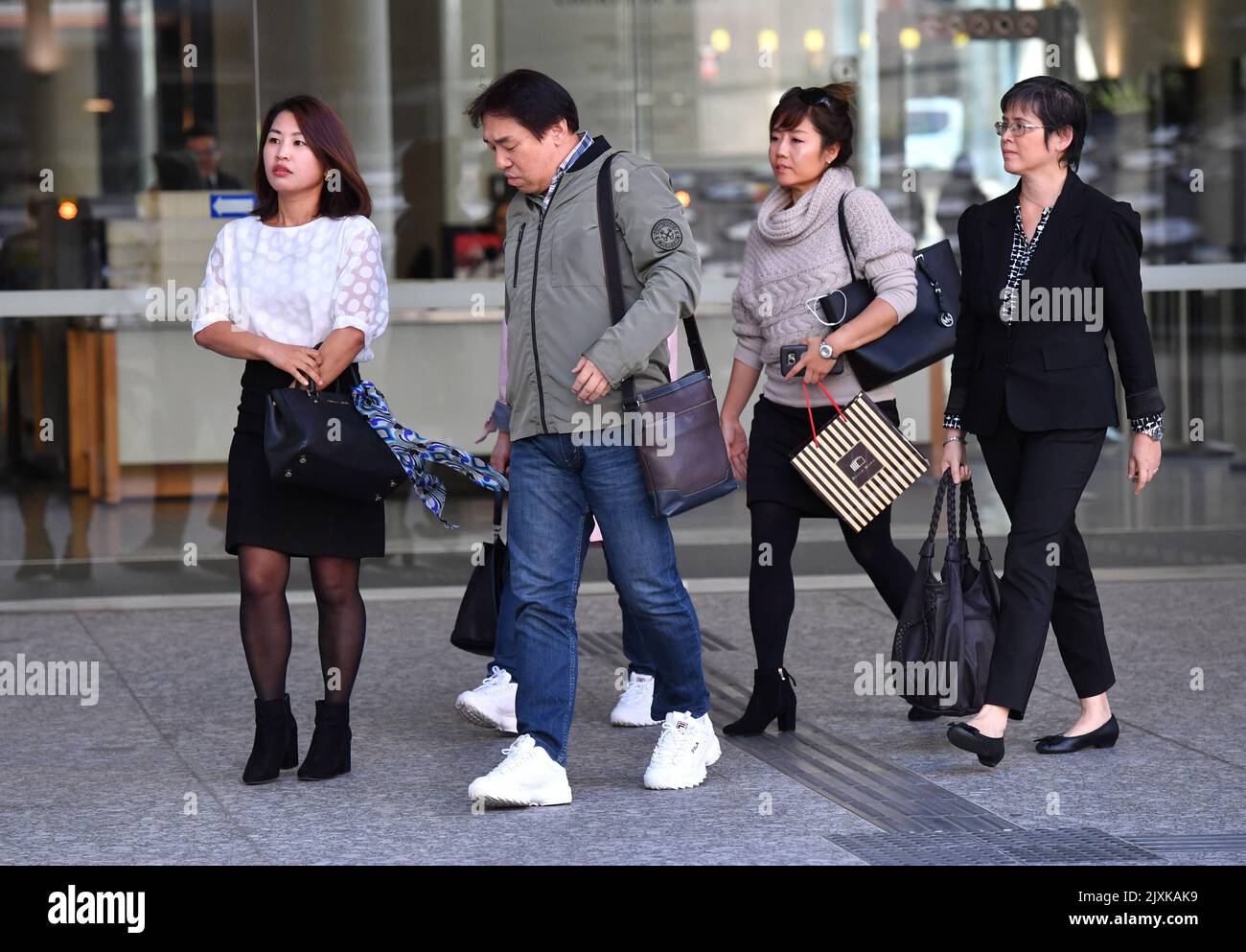 Family members of murdered South Korean student Eunji Ban are seen ...