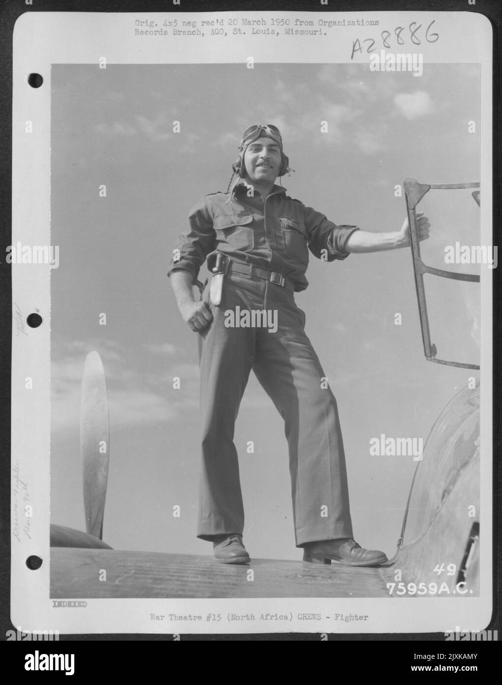 A Pilot Of The 90Th Photographic Reconnaissance Wing, Poses On The Wing ...