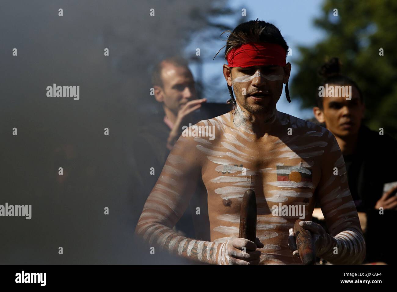 An Aboriginal dancer is seen during an Aboriginal land rights march ...