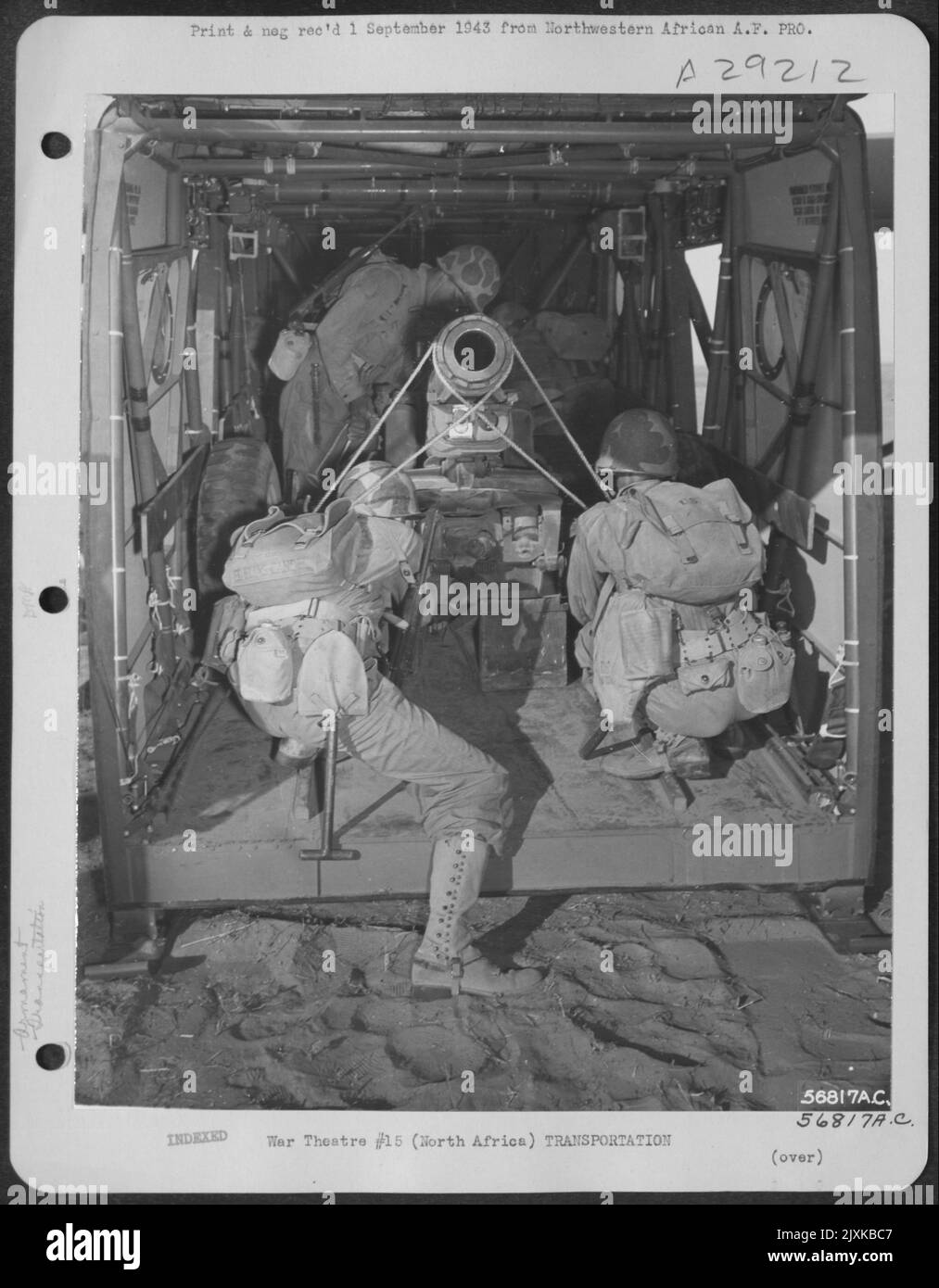 Airborne troops place special 105 mm gun in glider. NORTH AFRICA Stock ...