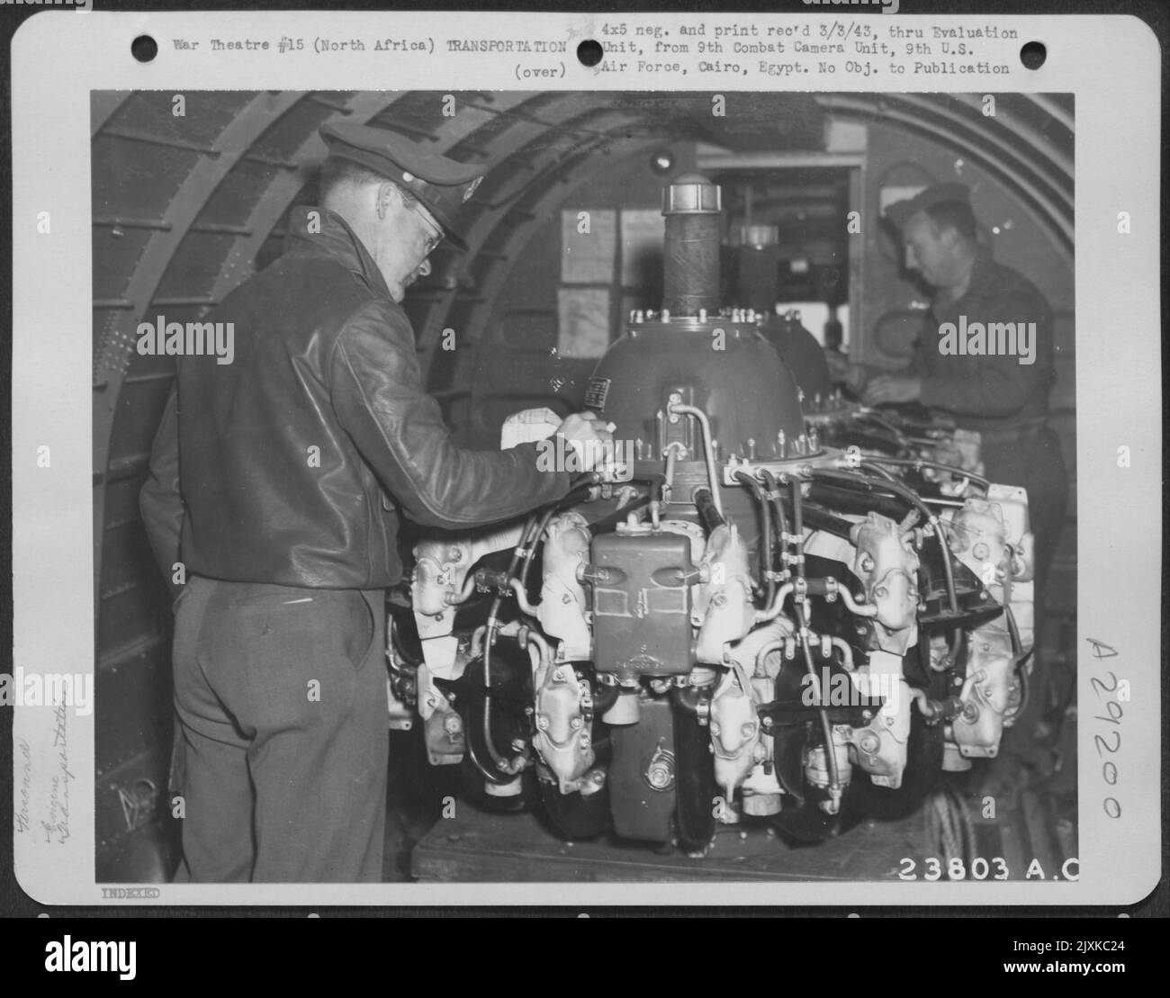 Lt. J.B. Edgar checking Pratt and Whitney engine loaded aboard U.S ...