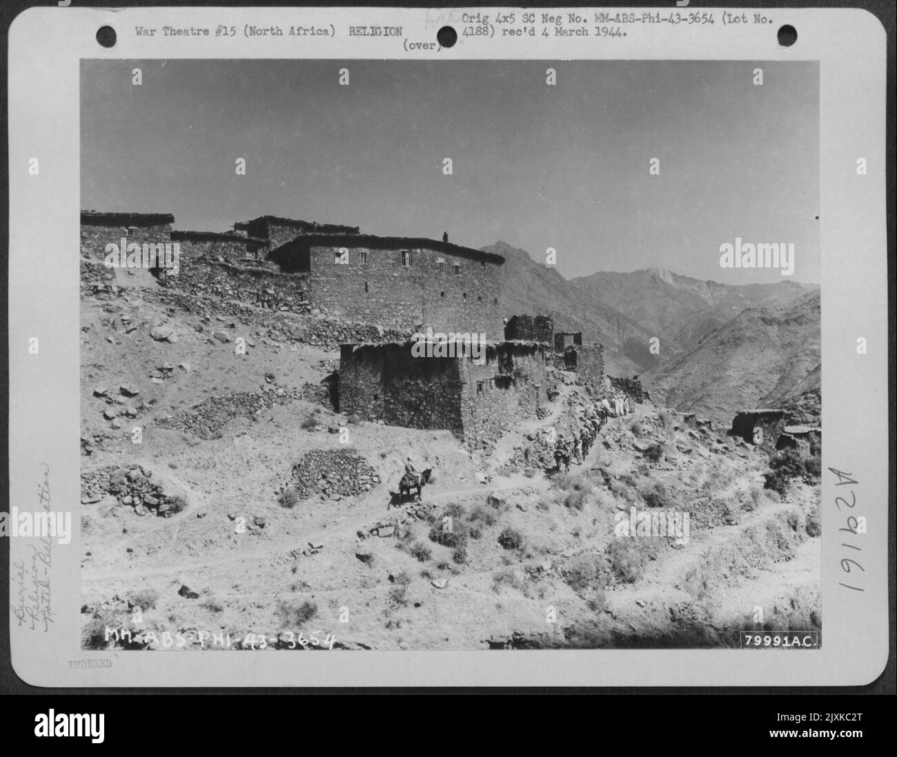 Native guides and U.S. military personnel move toward Marrakech, North ...