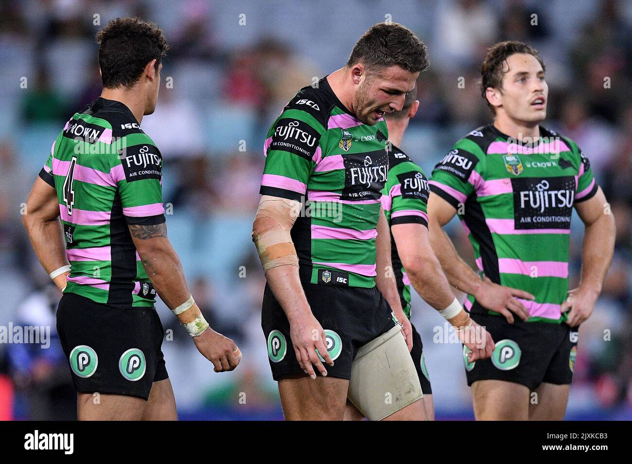 Sam Burgess of the Rabbitohs (centre) reacts during the Round 22 NRL ...