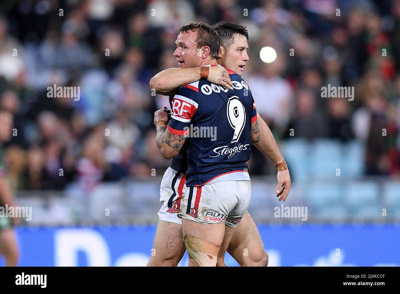 Cooper Cronk and Jake Friend of the Roosters celebrate following their ...