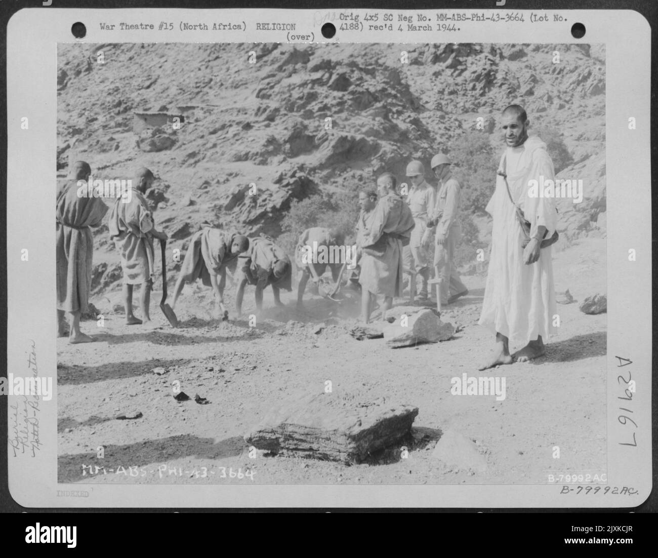 Natives remove the bodies of Air Force dead near Marrakech, North ...