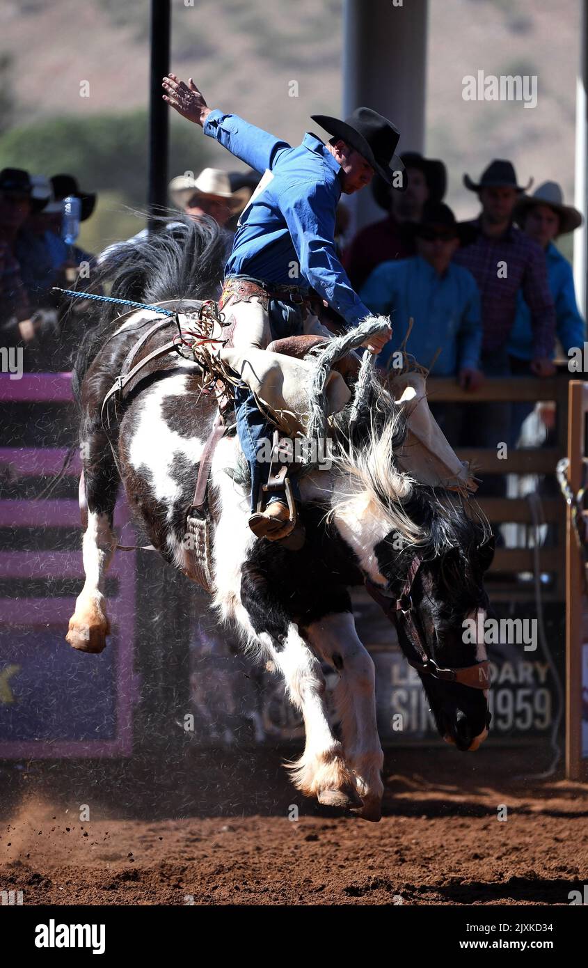 Tim Hammond competes in the Saddle Bronc event at the Mount Isa Mines ...