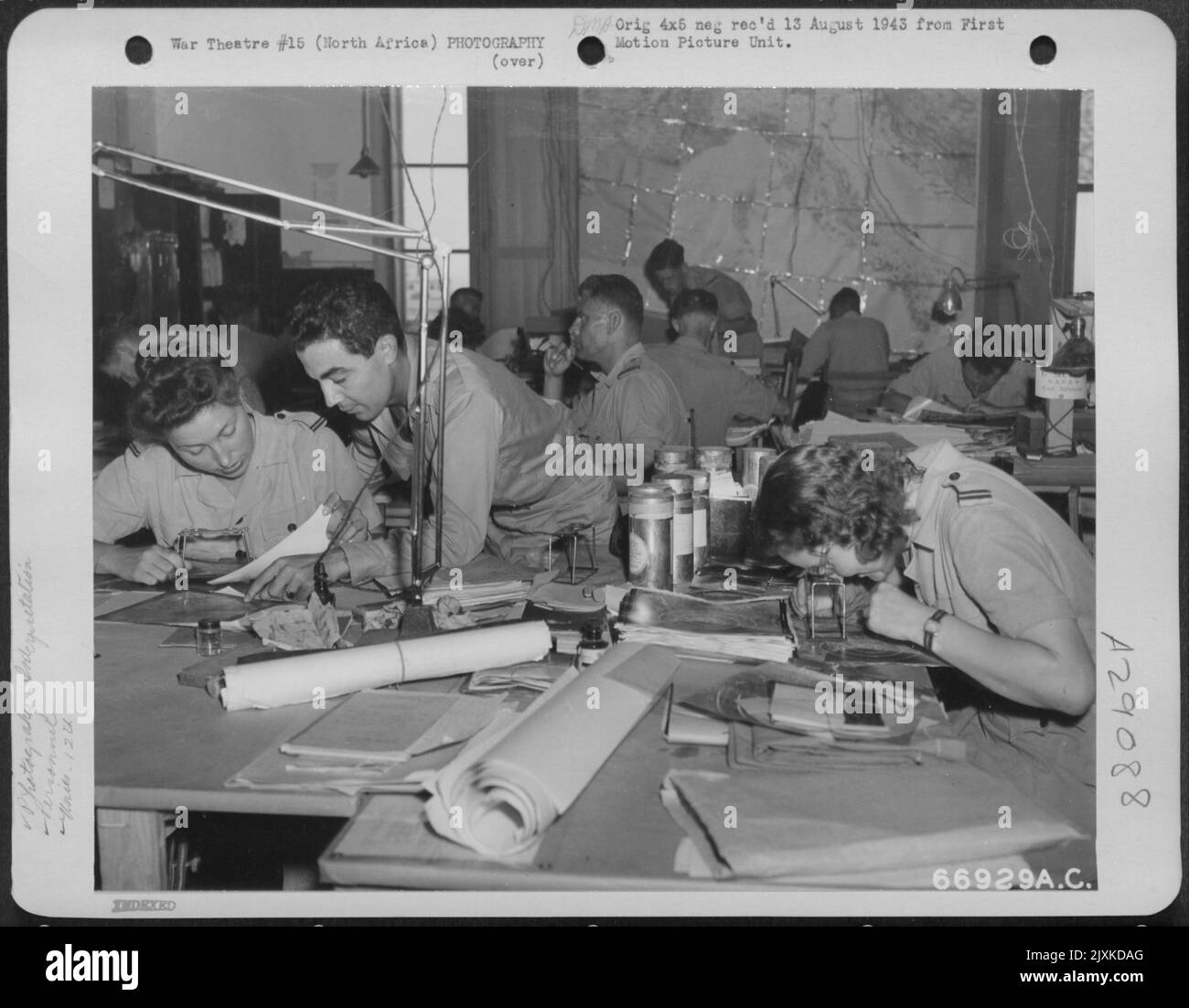 The interpretation experts study the prints taken on a photo ...