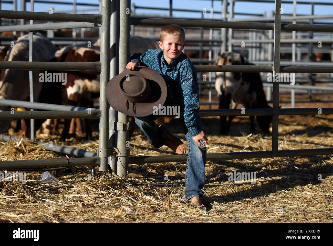Ten year-old Riley Schmidt poses for a photo after winning the Poddy ...