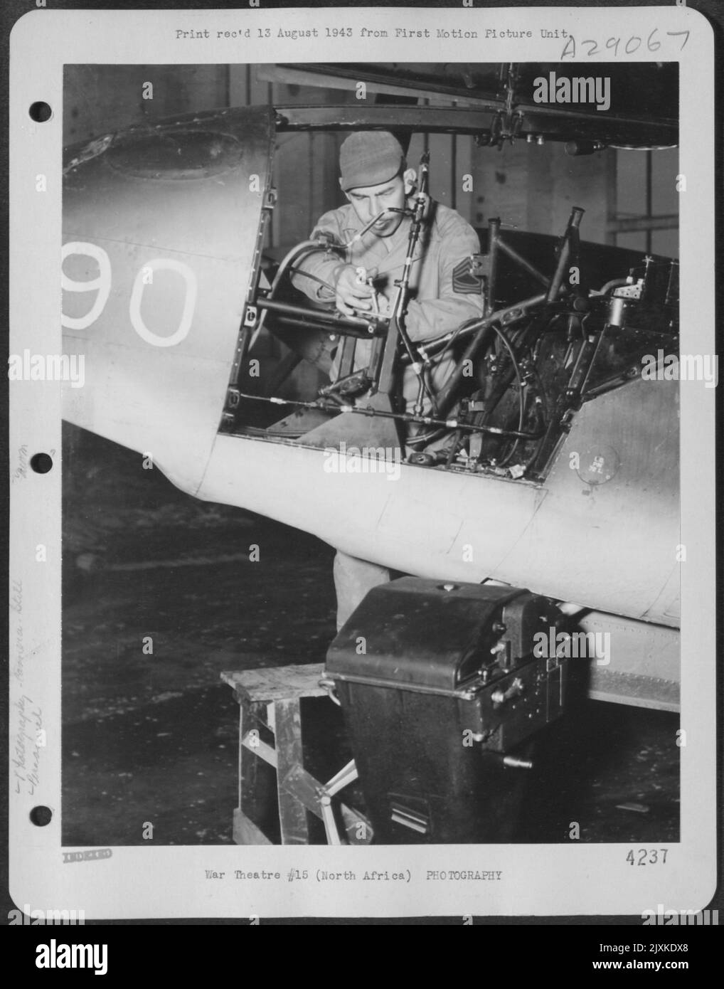 M/Sgt. Lewis E. Watson, Walled Lake, Mich., installs a camera in a ...