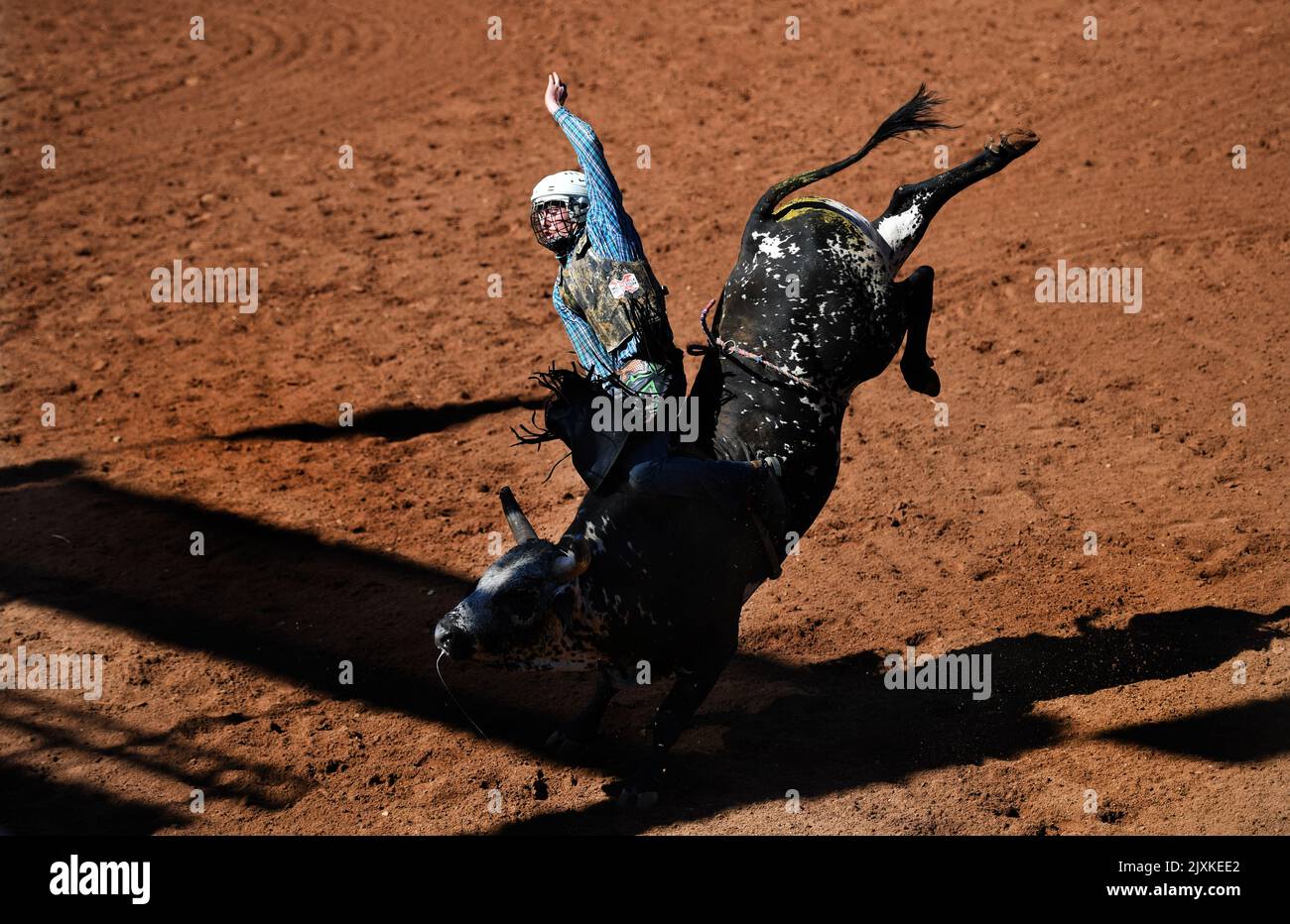 Troy Berry competes in the open bull ride event at the Mount Isa Mines ...