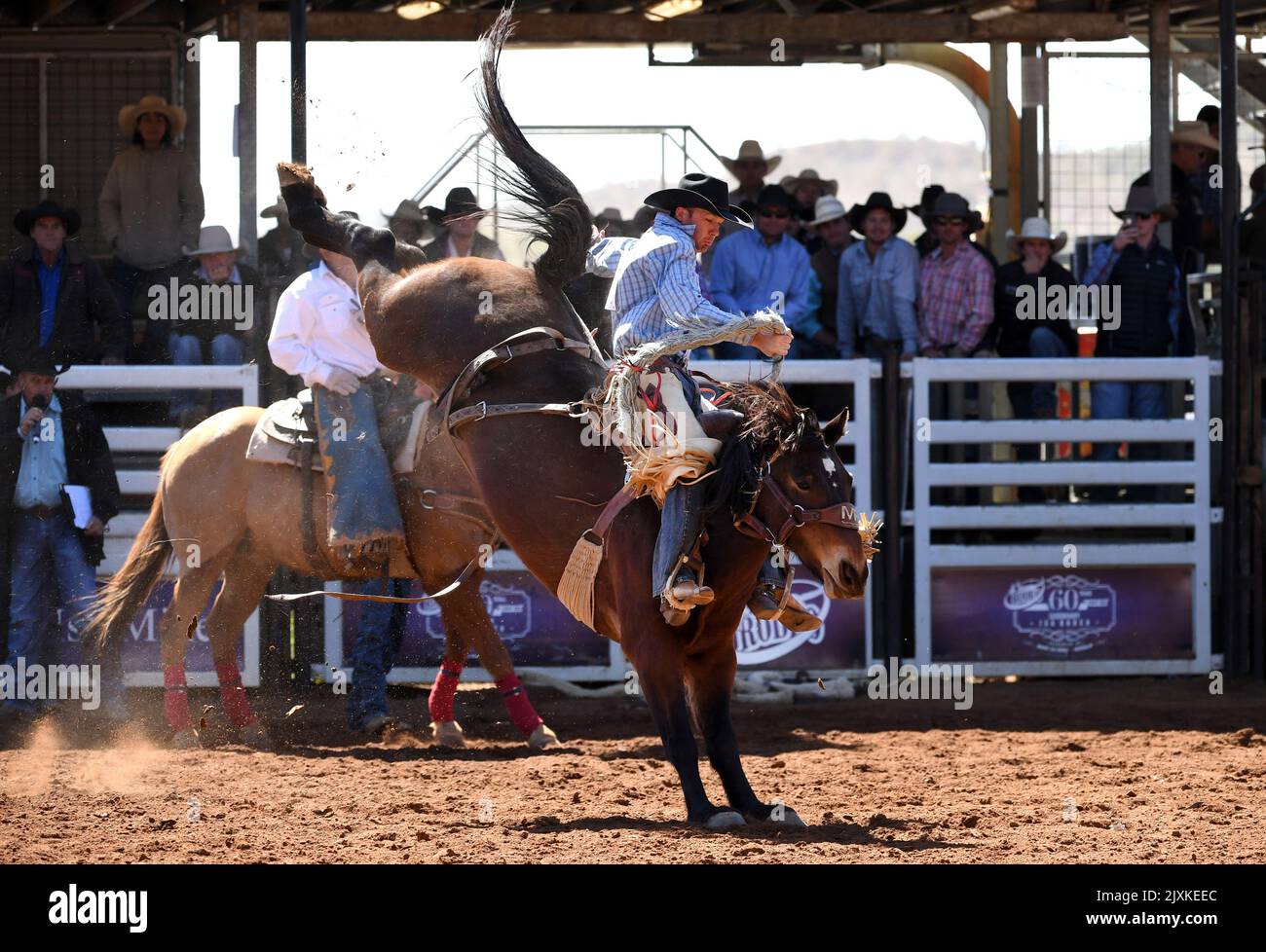 Tim Hammond competes in the saddle bronc final event in the event at ...
