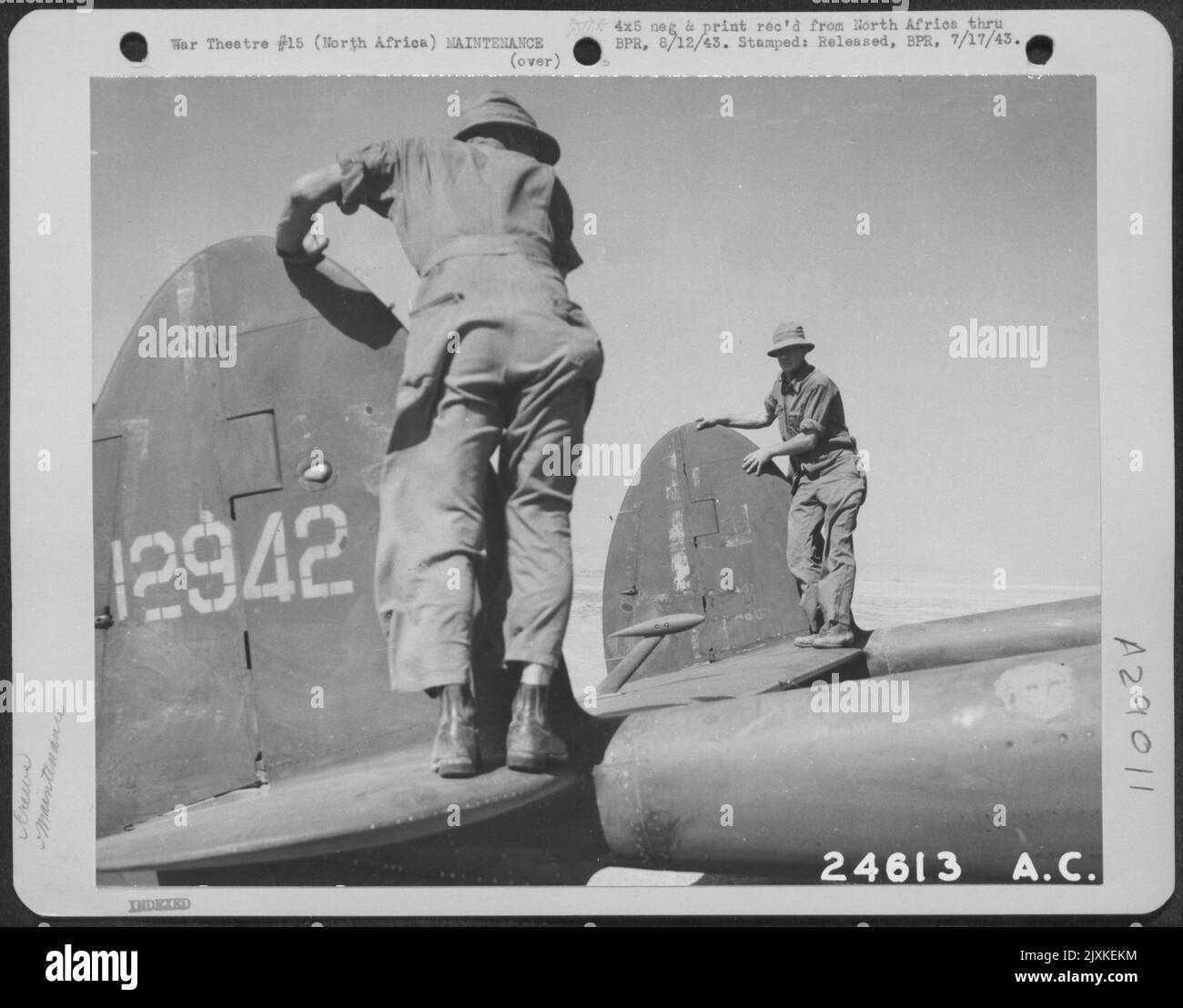North Africa-Lockheed P-38 plane crews bouncing up and down on tail of ...