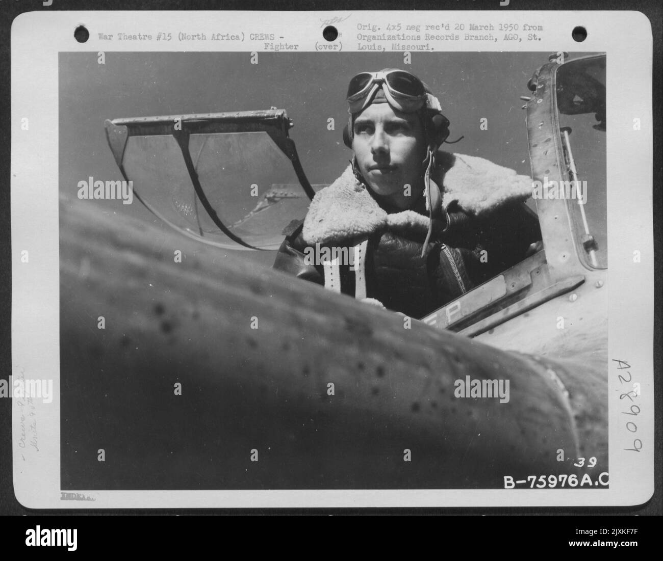 A pilot of the 90th Photographic Reconnaissance Wing, poses in the ...