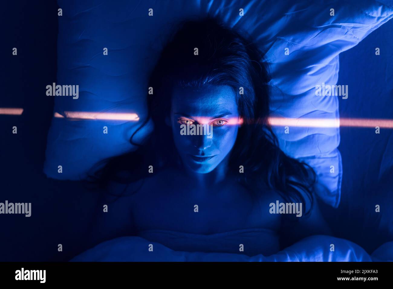 Close-up of lonely woman suffering from insomnia and depression, lying ...