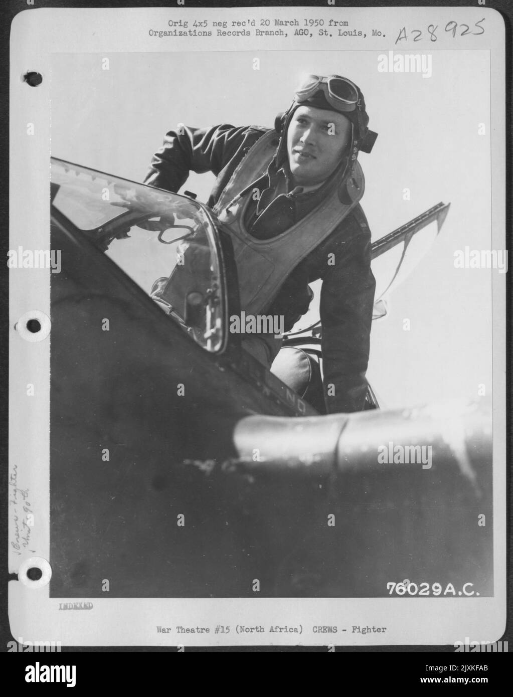 A pilot of the 90th Photographic Reconnaissance Wing, steps into the ...