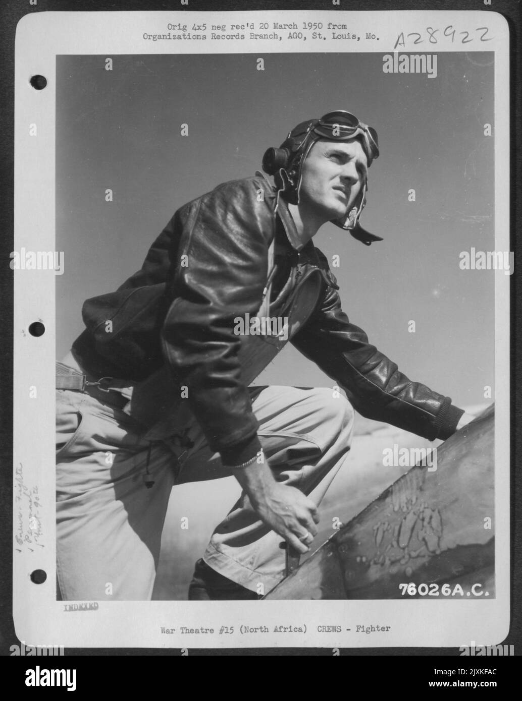 Lt. Jenkins, Pilot of the 90th Photographic Reconnaissance Wing, steps ...