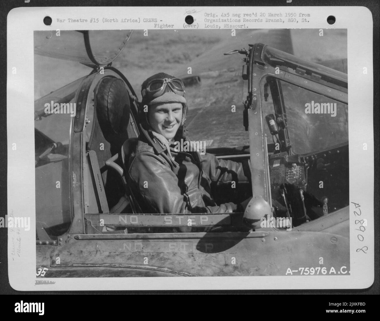 A pilot of the 90th Photographic Reconnaissance Wing, poses in the ...