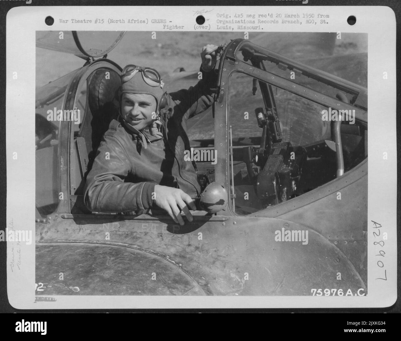 A pilot of the 90th Photographic Reconnaissance Wing, poses in the ...