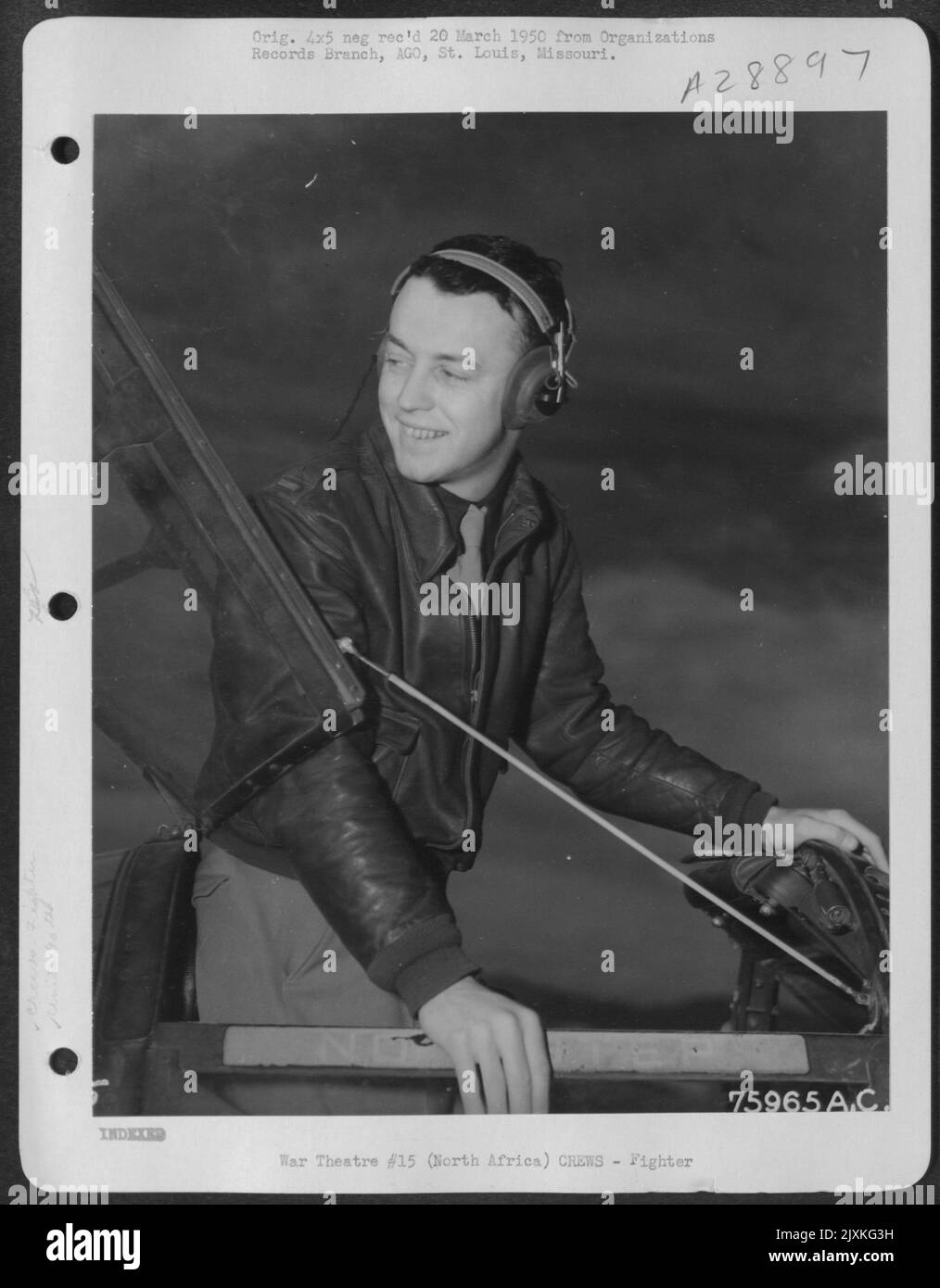 A pilot of the 90th Photographic Reconnaissance Wing, poses in the ...