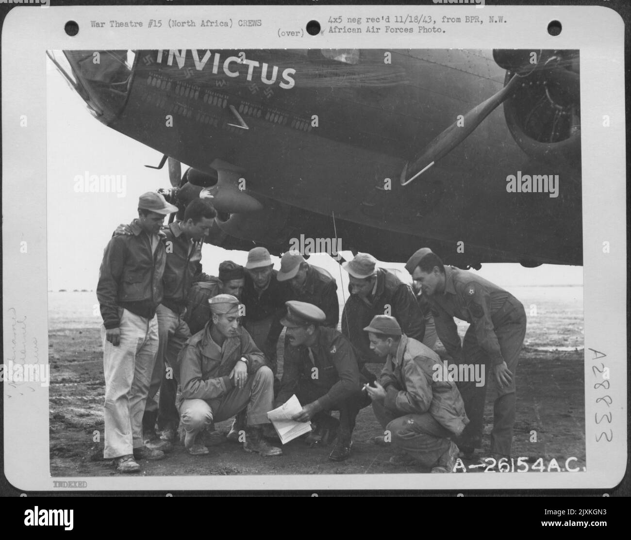 New York Air Crew is questioned by a ground officer upon their return ...