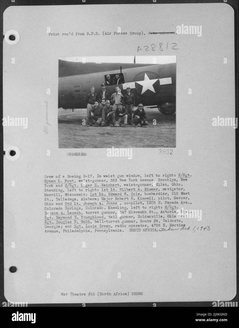 Crew of a Boeing B-17. In waist gun window, left to right: S/Sgt. Hyman ...