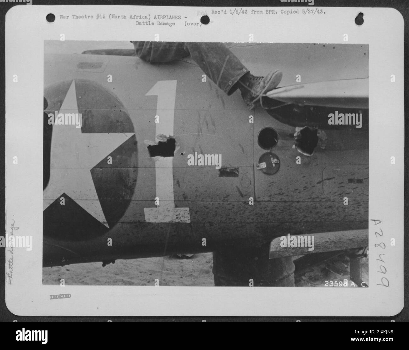 North Africa-The punctures in this U.S. Fighter were caused by 20 mm ...