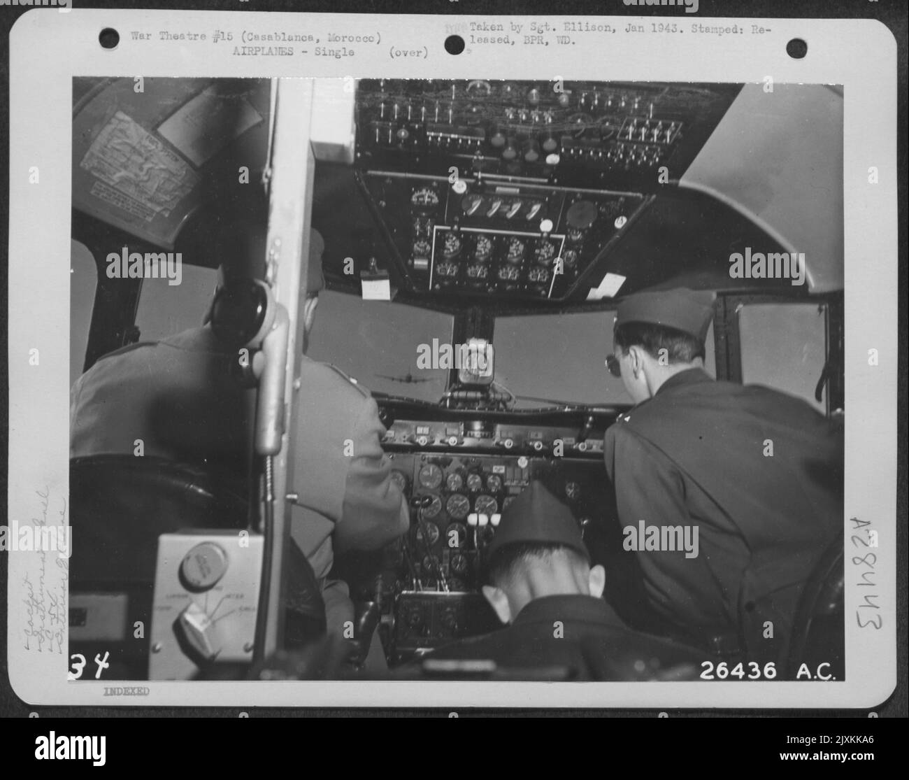 Thru the windows in the cockpit of a second plane, one can see ...