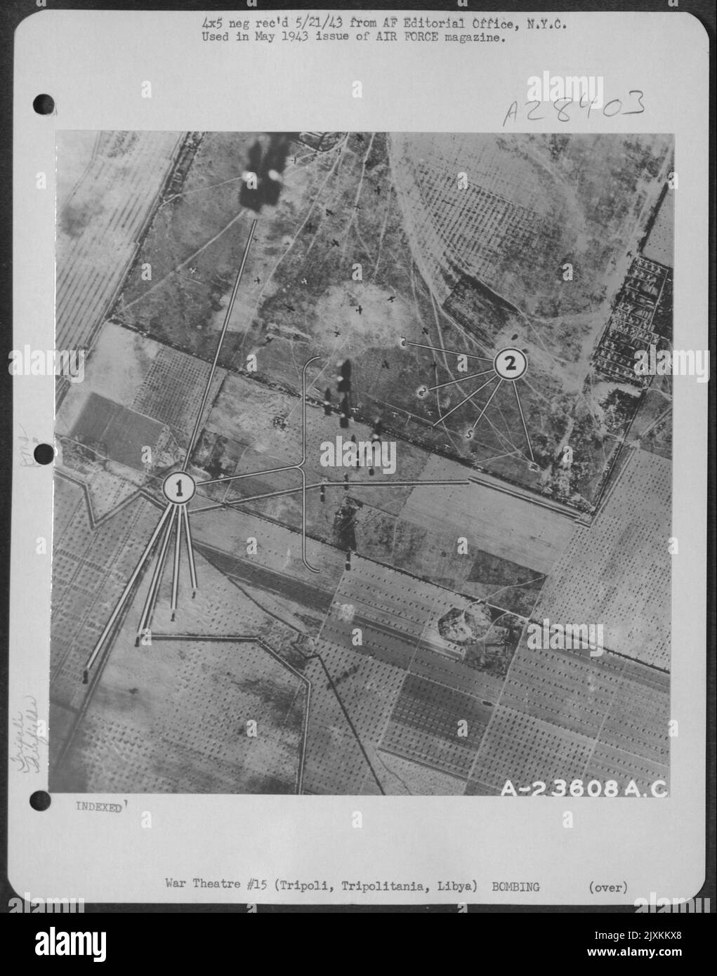 Bombs away! Sticks of bombs (1) extending the length of the photo ...