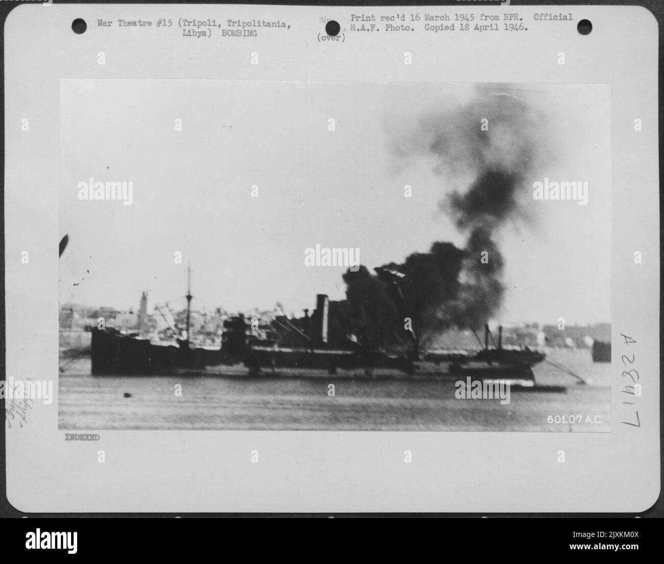 A seven thousand ton ship, anchored at Tripoli, Tripolitania, was hit ...