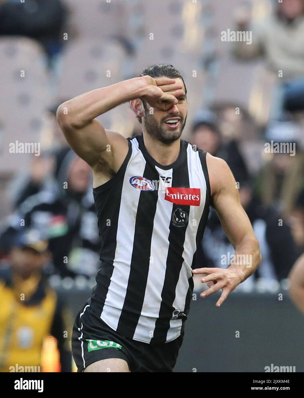 Brodie Grundy of the Magpies reacts after scoring a goal during the ...