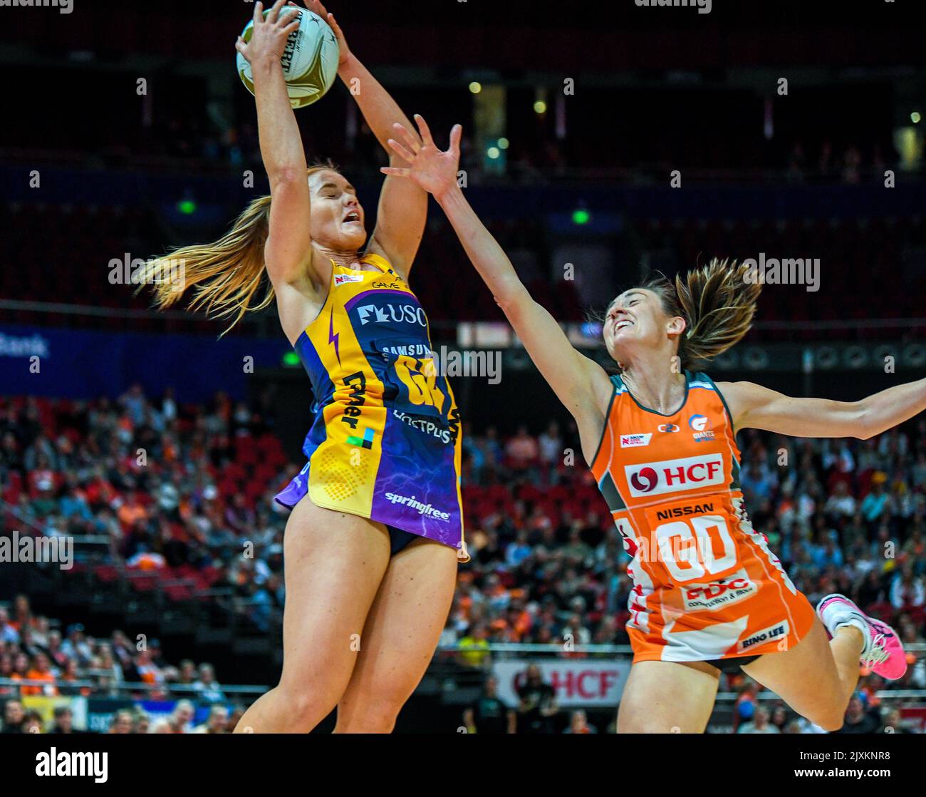 Stephanie Wood (left) of the Lightning competes for possession against ...