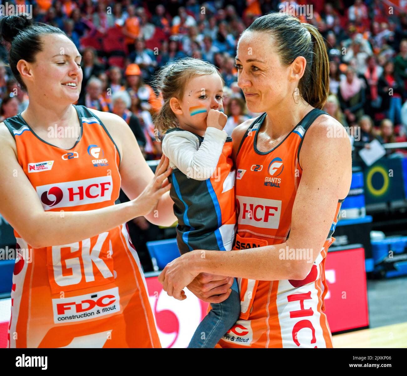 Bec Bulley (right) of the Giants announces her retirement during the ...