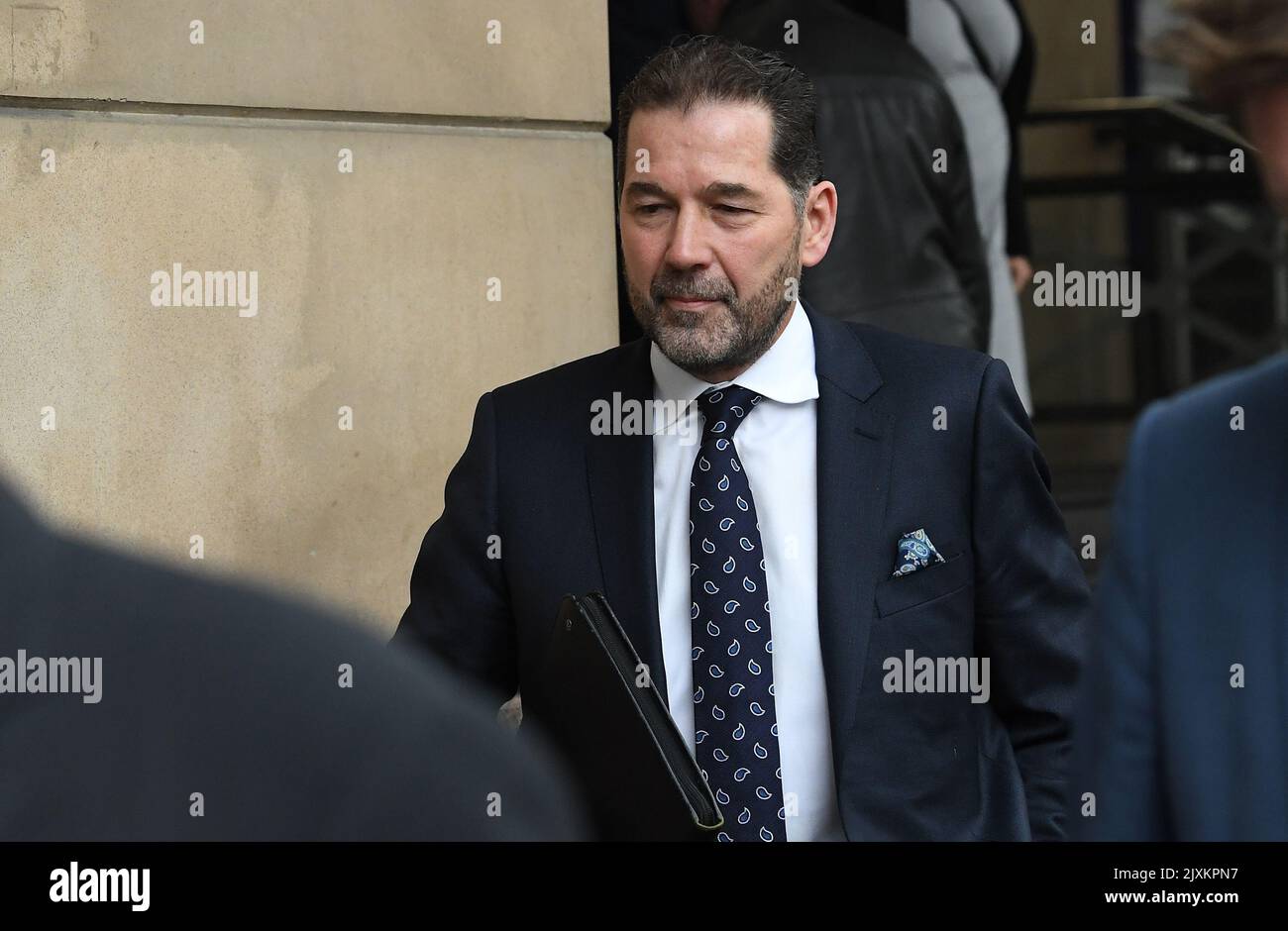 Malcolm Hooper leaves the Melbourne Magistrates Court in Melbourne ...