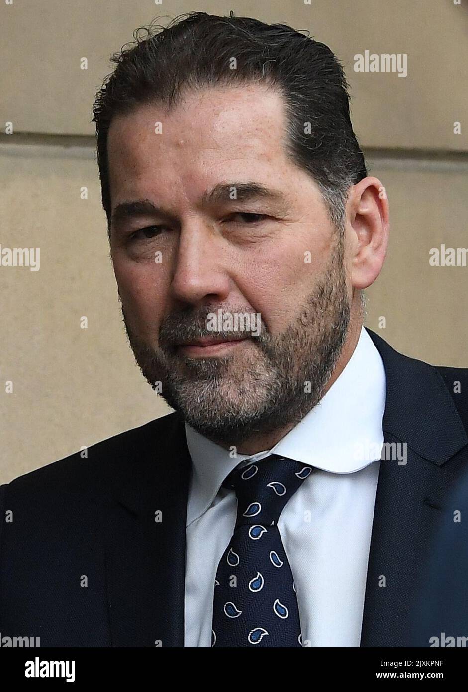 Malcolm Hooper leaves the Melbourne Magistrates Court in Melbourne ...