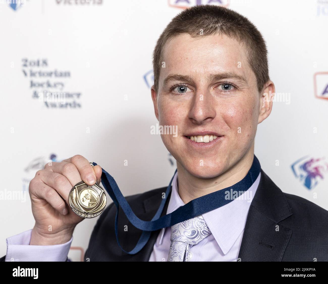 Damian Lane poses for a photograph with the Most Valuable Jockey award ...