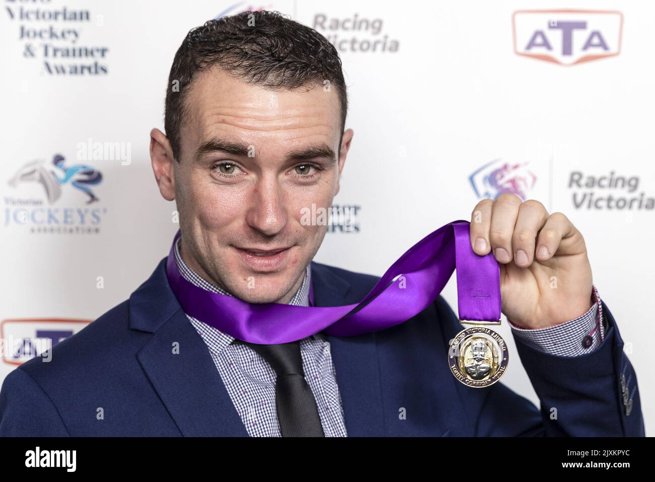 Martin Kelly poses for a photograph with the Tommy Corrigan Medal during the 2018 Victorian ...
