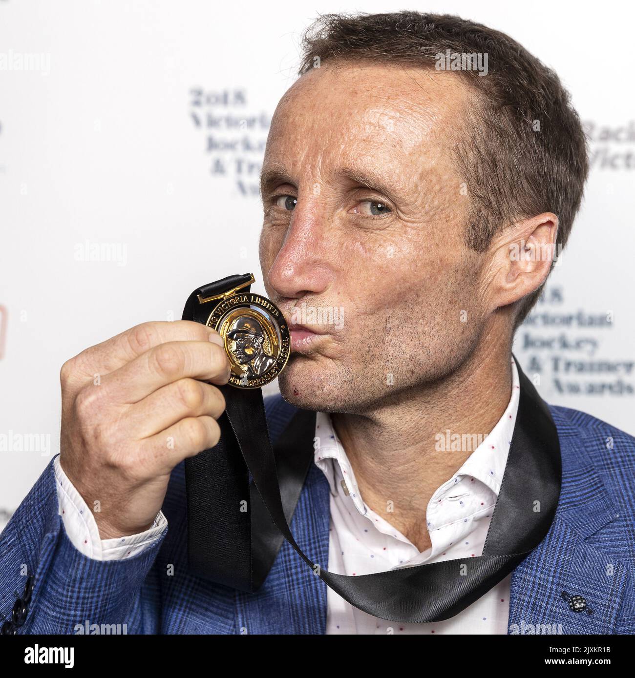 Damien Oliver poses for a photograph with the Scobie Breasley Medal ...