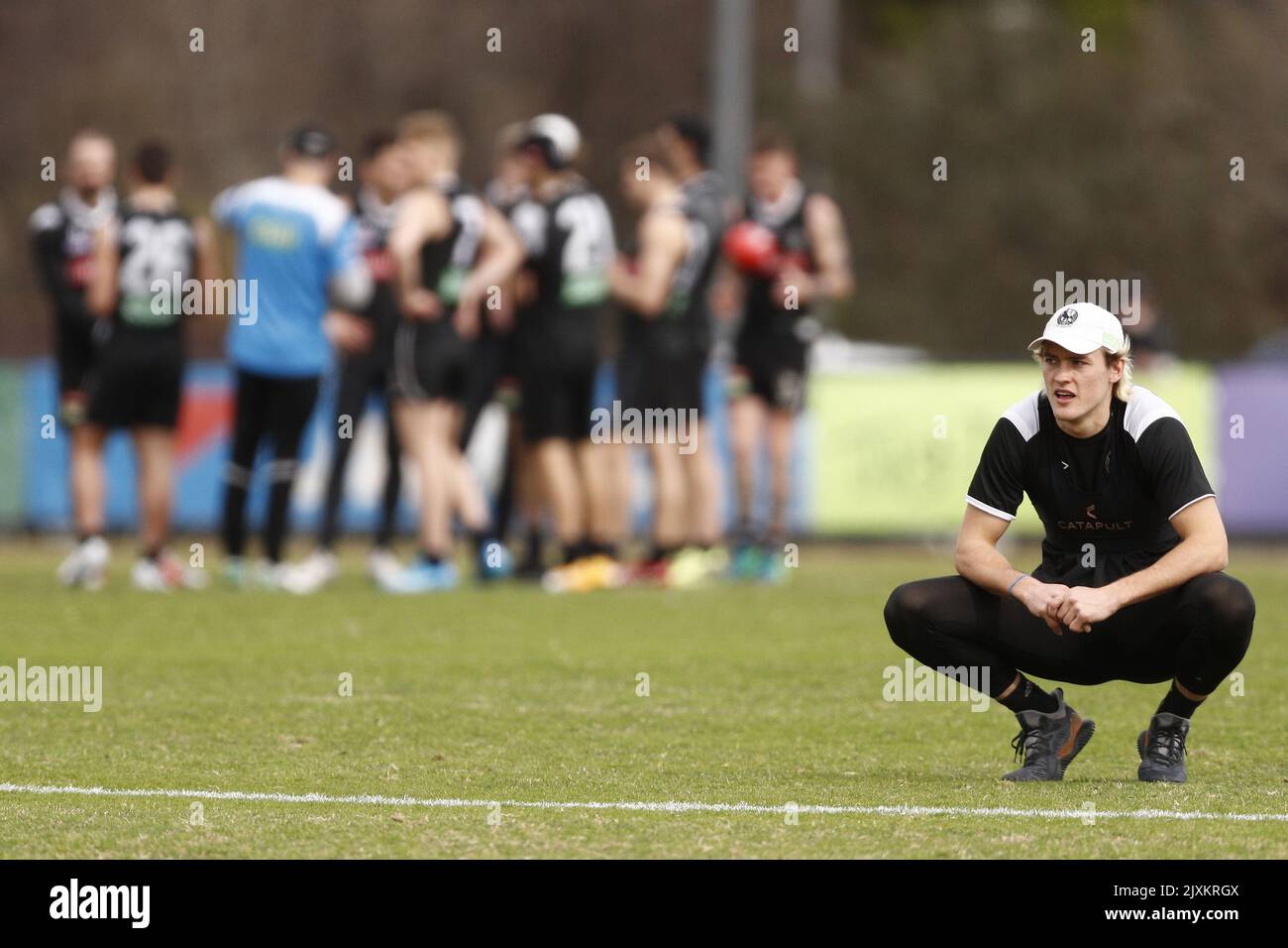 Darcy Moore (right) is seen during a Collingwood Magpies training ...