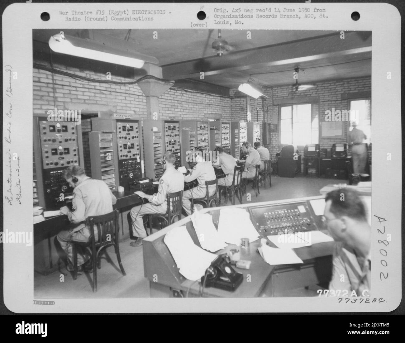 Air Force personnel of the 2nd Army Airways Communication Wing at work ...