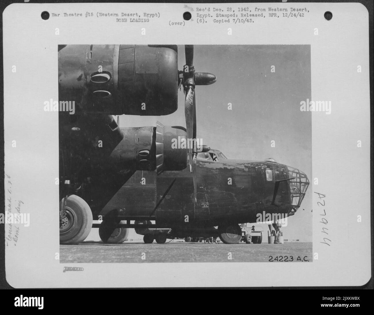 Loading bombs on a Consolidated B-24 "Liberator" somewhere in the Western Desert, Egypt Stock ...