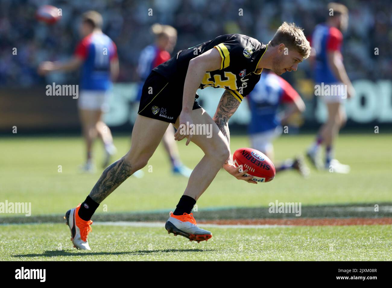 Nathan Broad of the Tigers gathers the ball during the Round 23 AFL ...