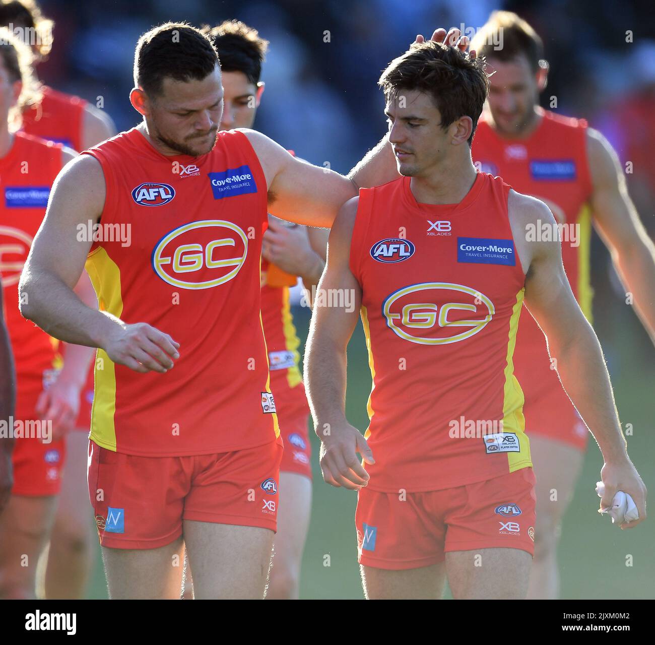 (L-R) Steven May and Jarryd Lyons leave the ground after the Round 23 ...