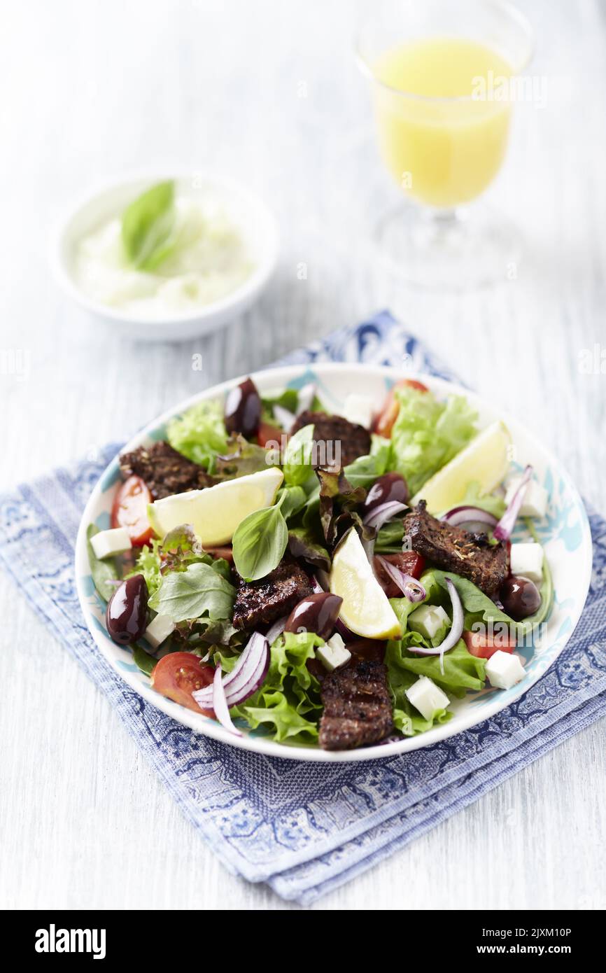 Salad with Grilled Beef Pieces, Cherry Tomatoes, feta Cheese and ...