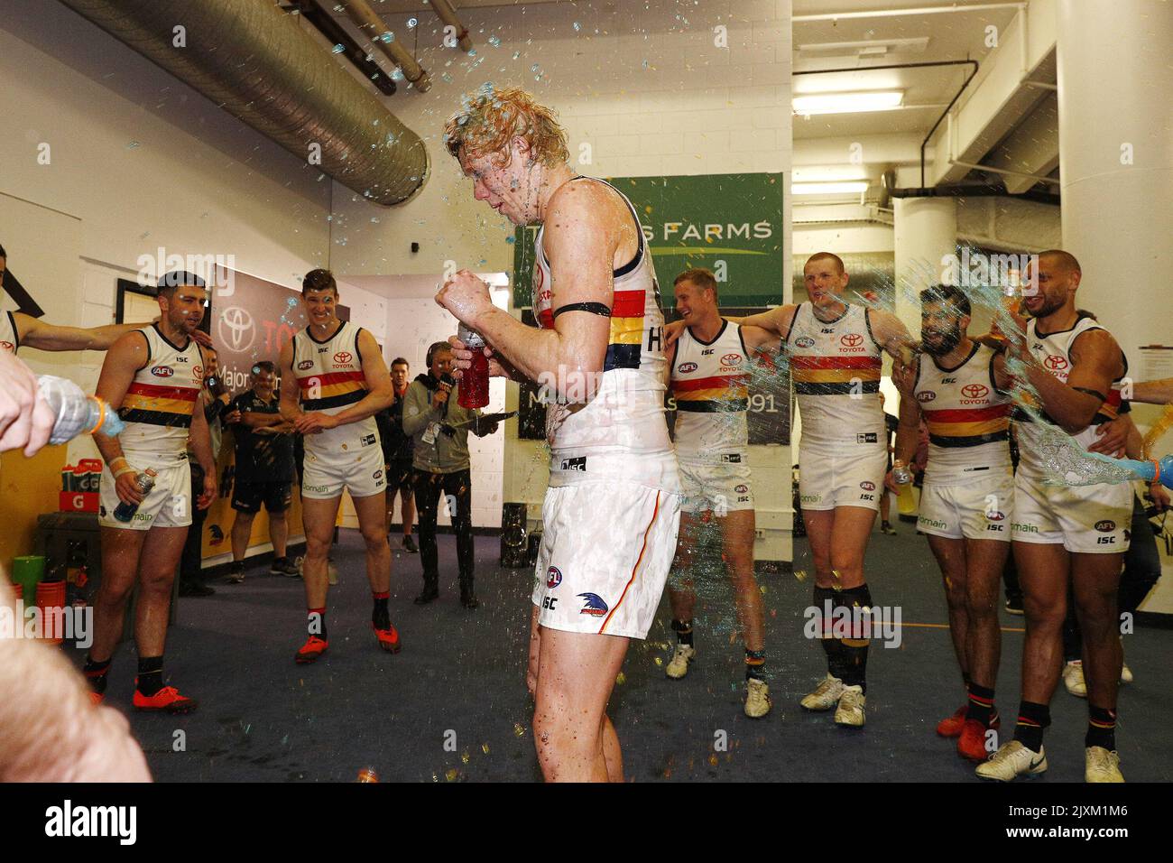 Elliott Himmelberg of the Crows is doused with Gatorade whilst the ...