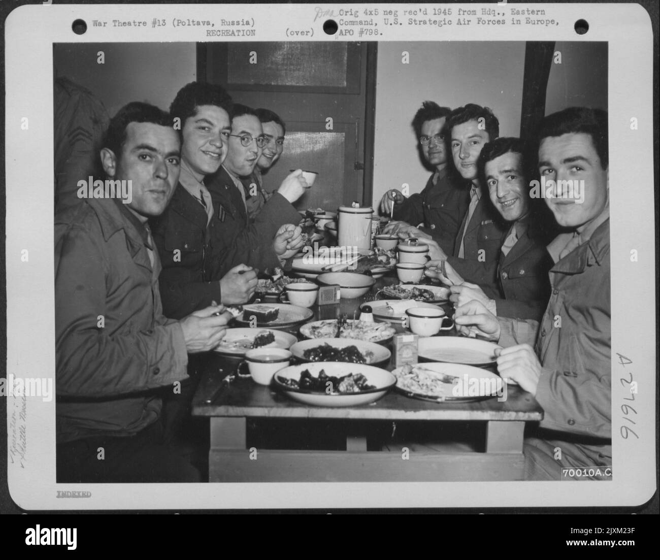 GI's do justice to their Thanksgiving dinner, the first meal served in ...