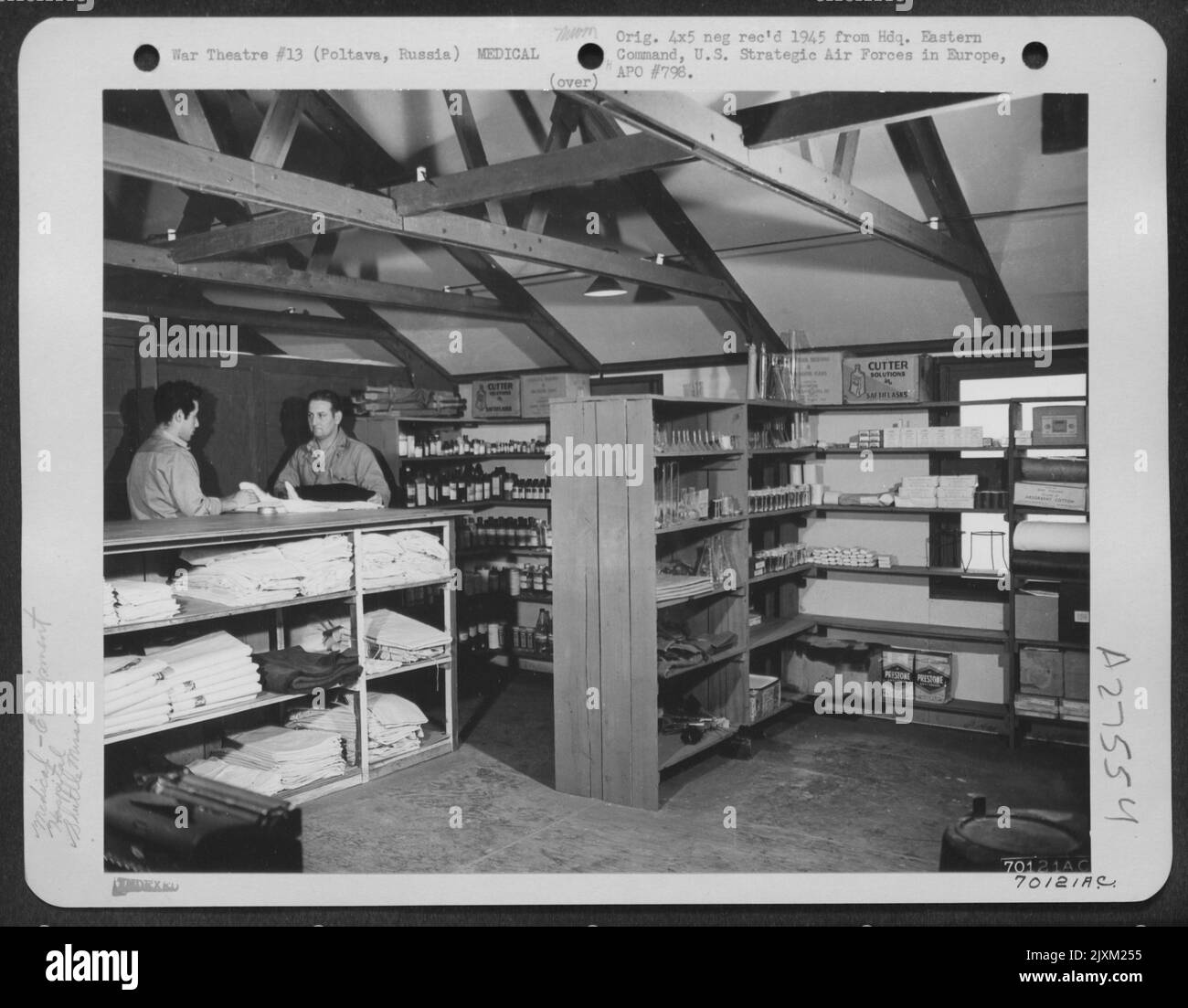 Two members of the winter detachment check medical supplies in the ...