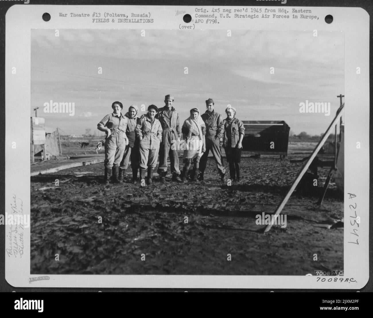 Two American GI's pose with a group of Russian women who work at ...