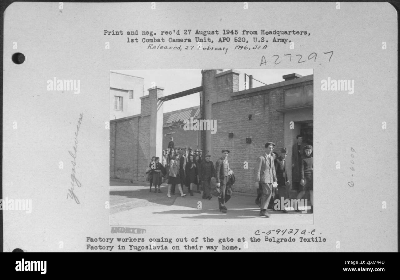Factory Workers Coming Out Of The Gate At The Belgrade Textile Factory ...