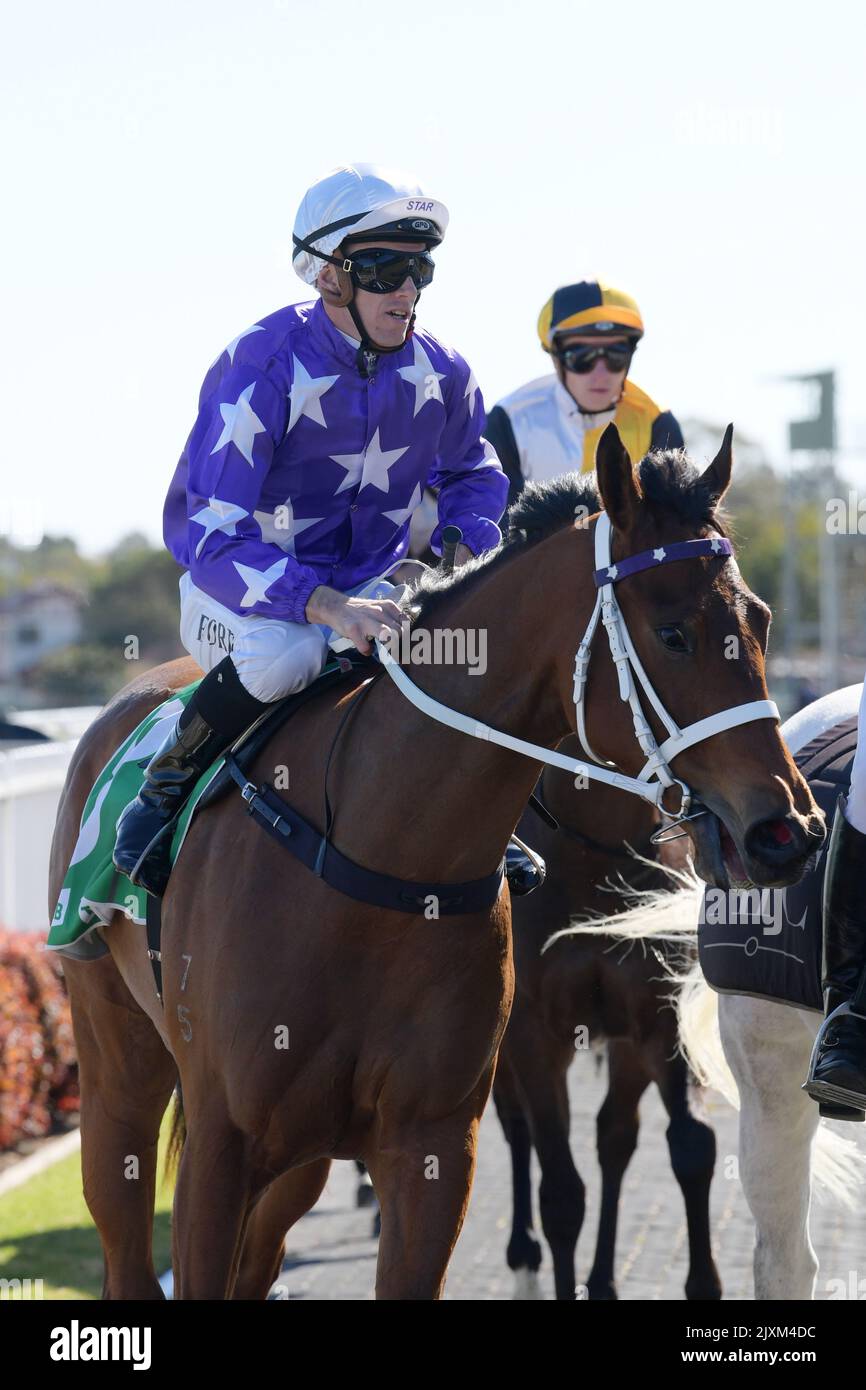 Jockey Jay Ford returns to scale after riding Aperitif to win race 2 ...