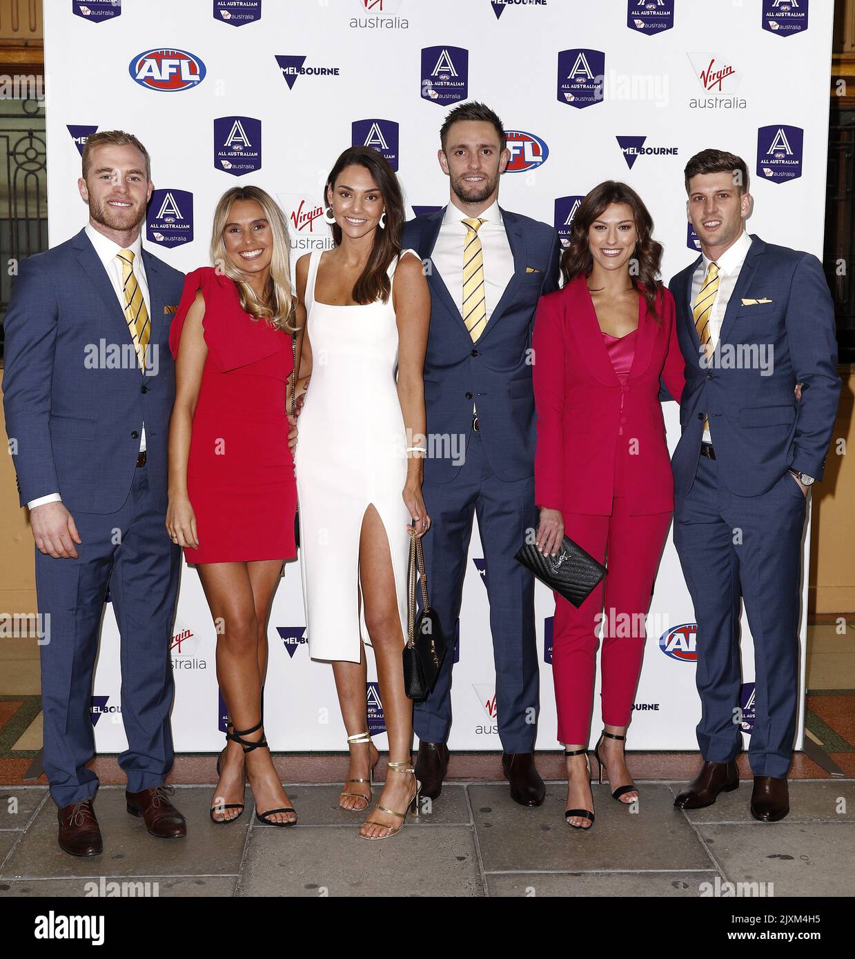 (L-R) Tom Mitchell of the Hawks and partner Hannah Davis, Dani Shreeve ...